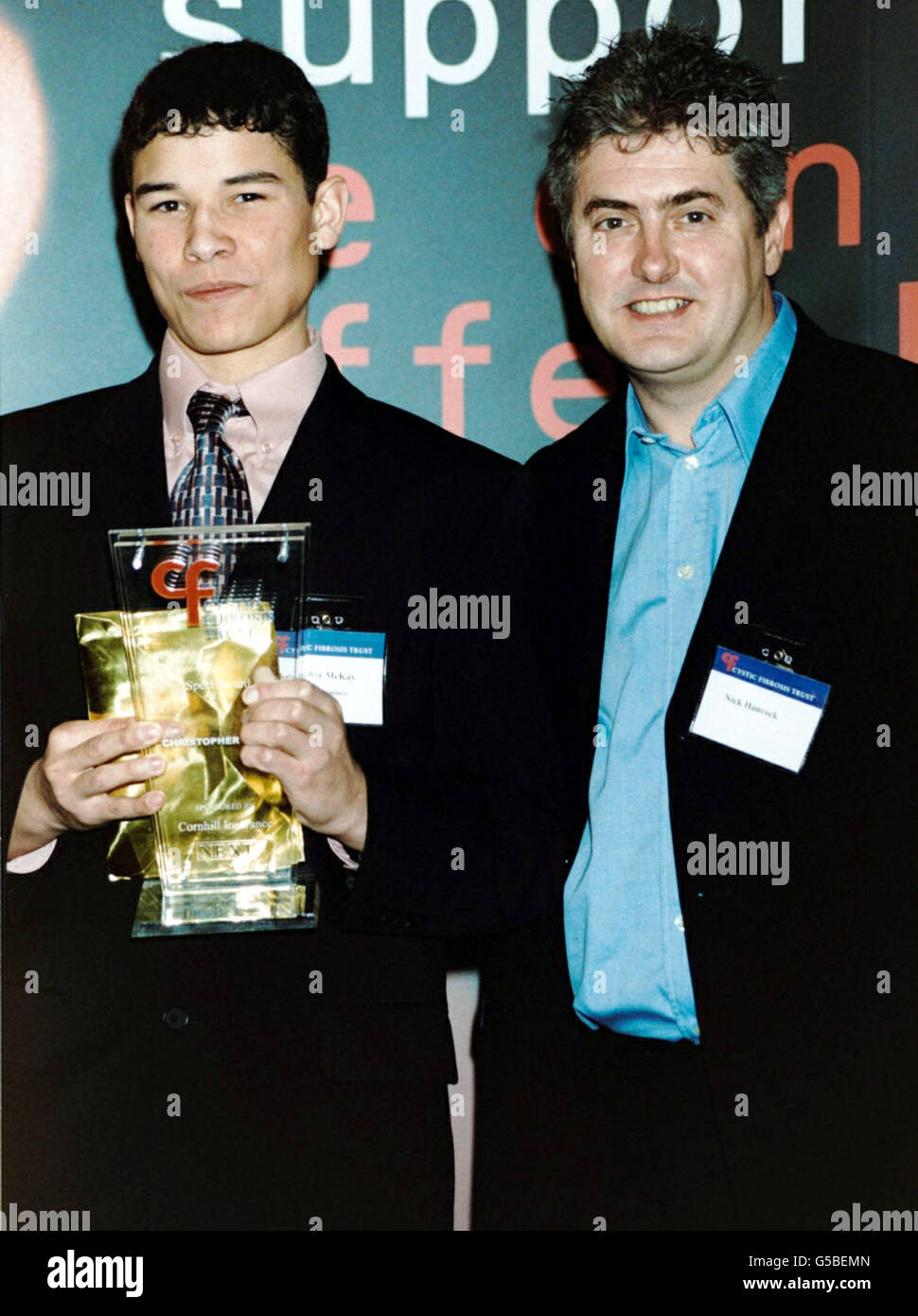 Comedian nick hancock with the sport award winner christopher mckay hi ...