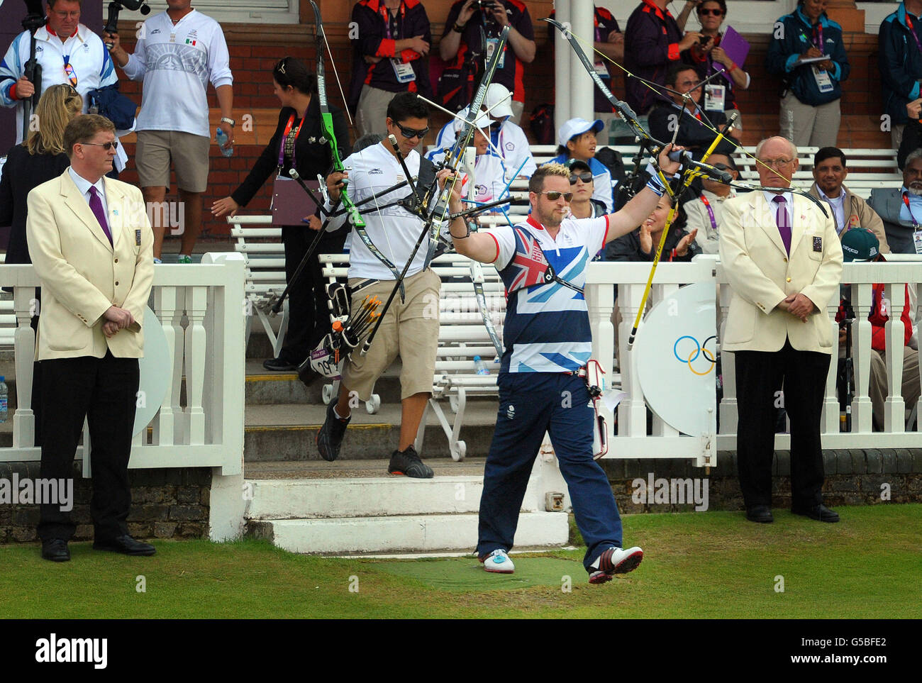 Great Britain's Larry Godfrey enters through the Pavilion Gate prior to ...