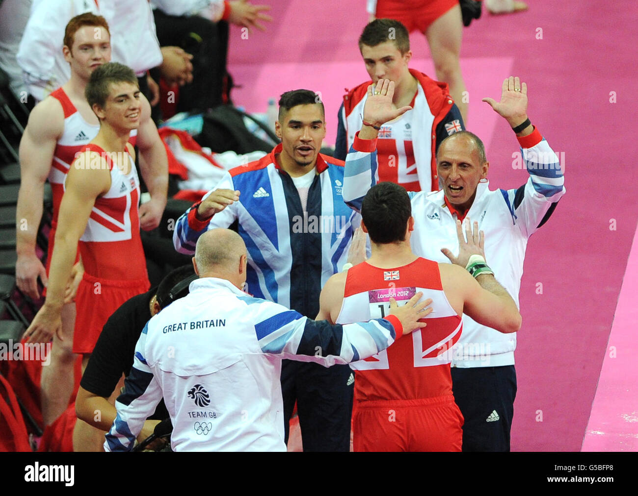 Great Britain's Kristian Thomas is congratulated after competing on the ...