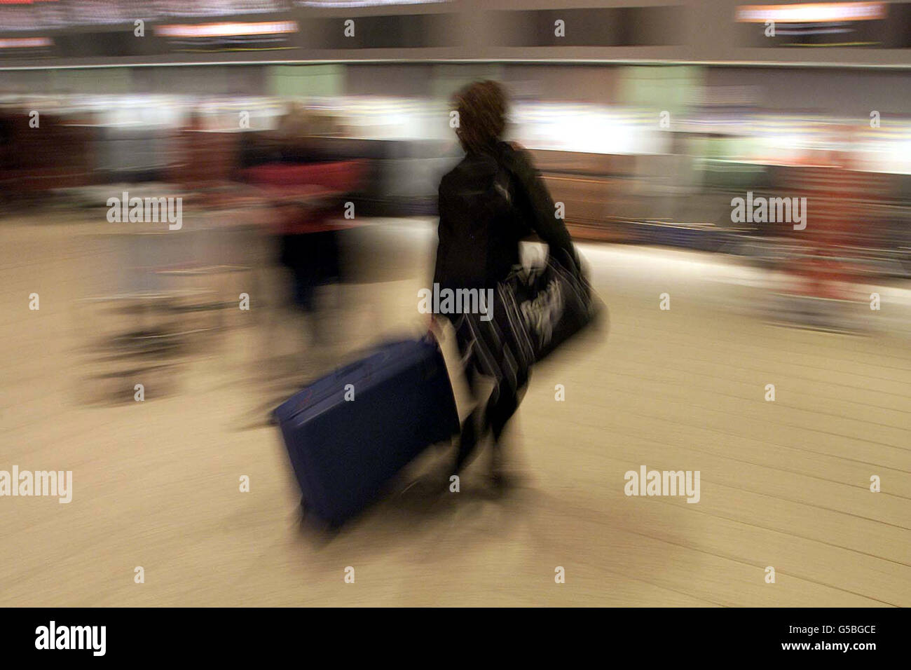 Holidaymakers suitcase hi-res stock photography and images - Alamy