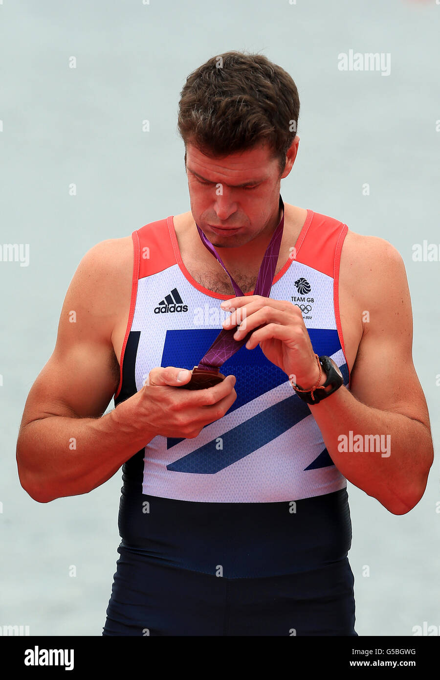Great Britain's Greg Searle celebrates with his bronze medal after the ...