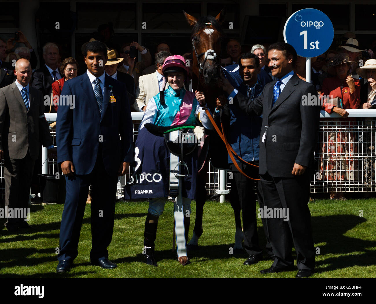 Tom Queally poses with Frankel in the winners enclosure after winning ...