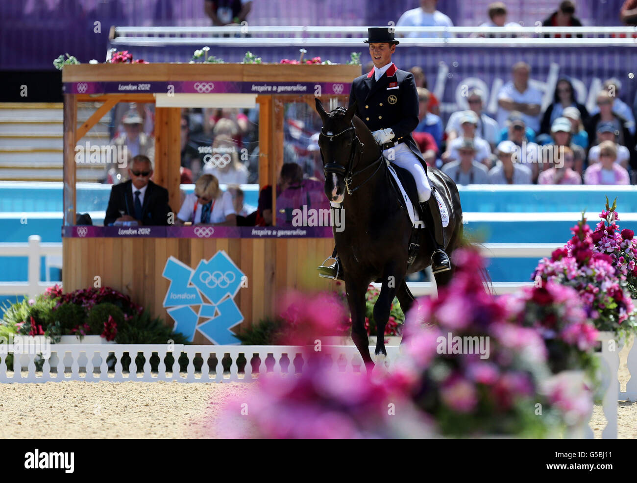 Great Britain's Carl Hester riding Uthopia competes in the Team and ...