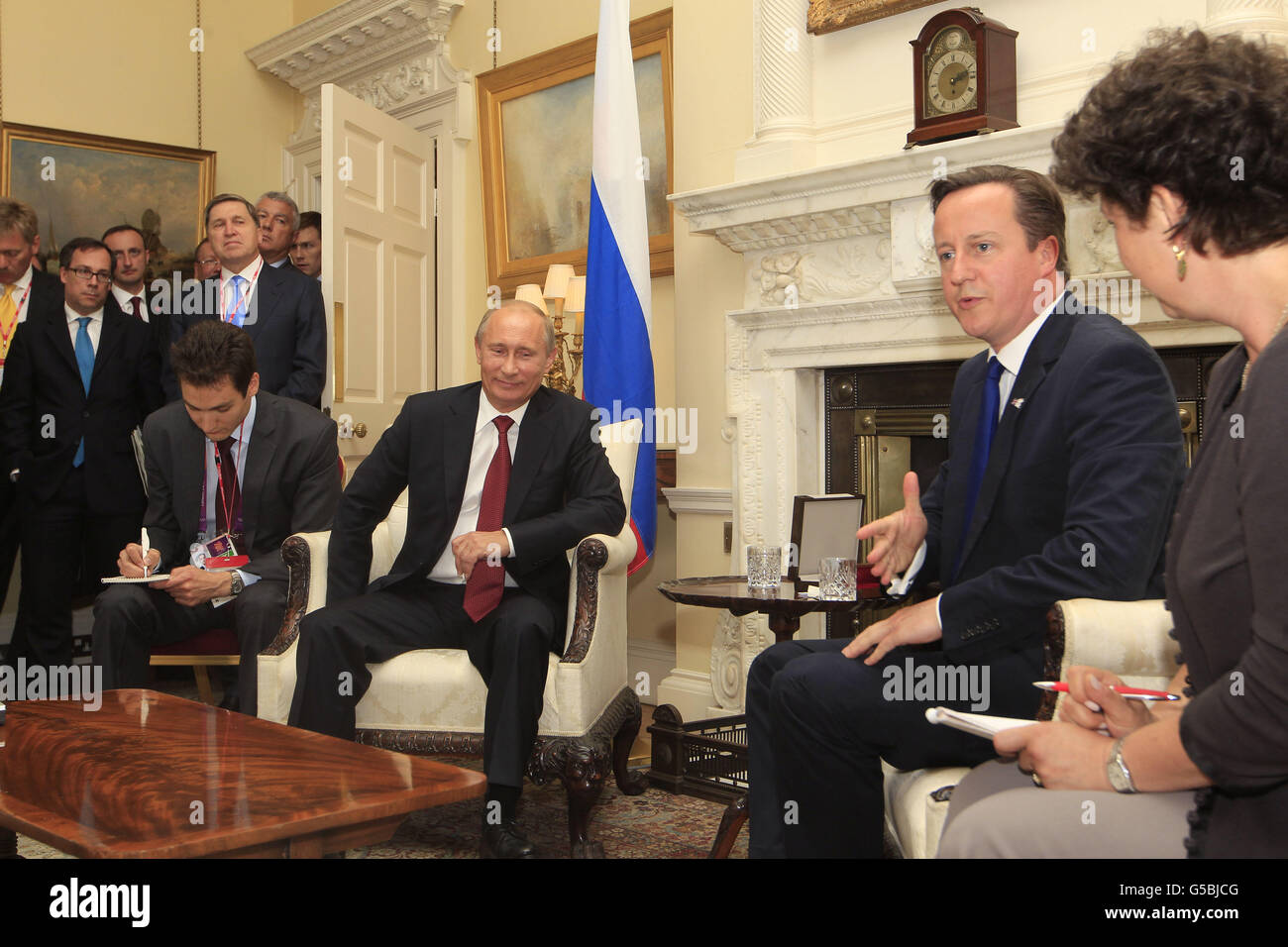 Prime Minister David Cameron and Russia's President Vladimir Putin ...