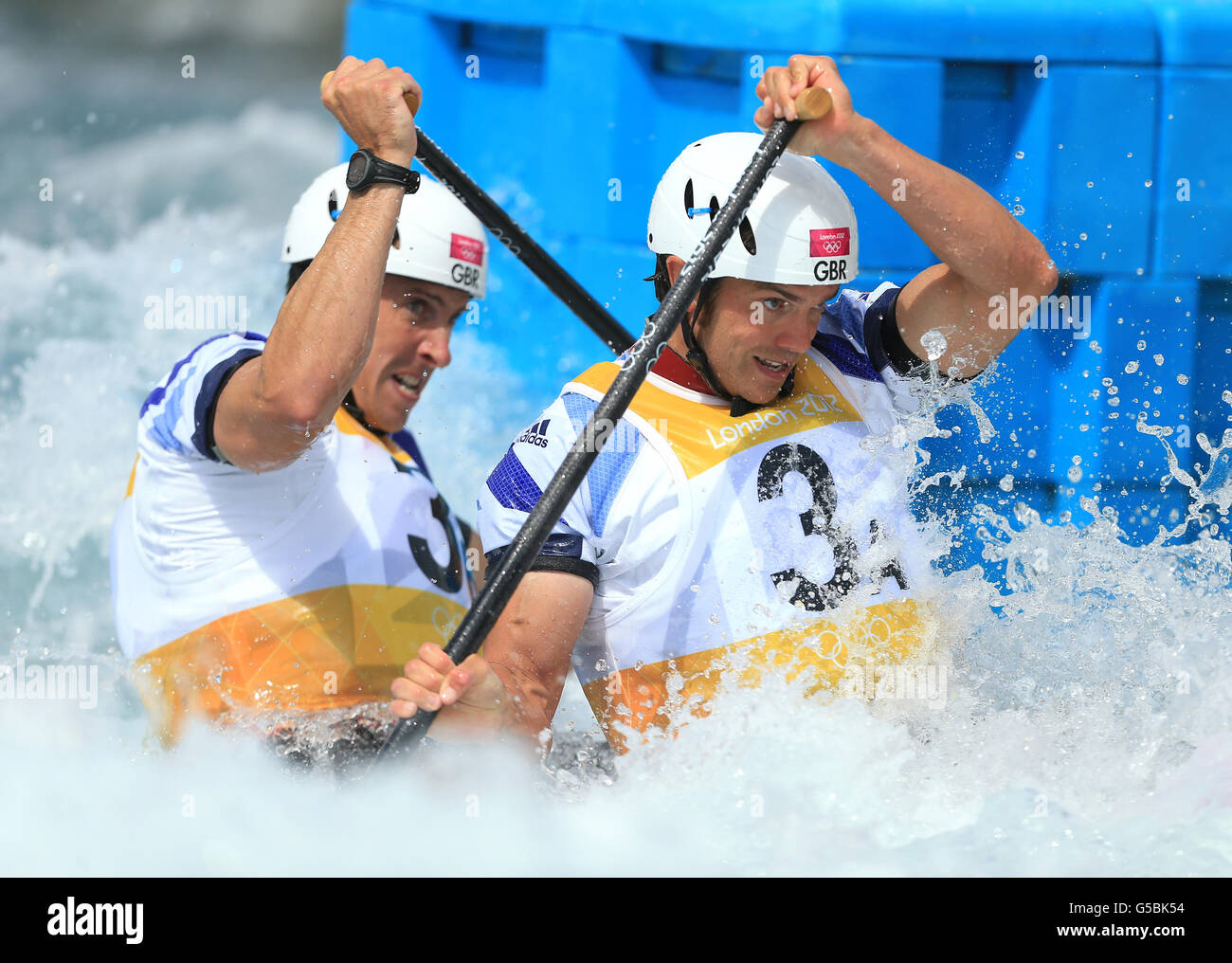 Great Britain's Tim Baillie and Etienne Stott (rear) on their way to a ...