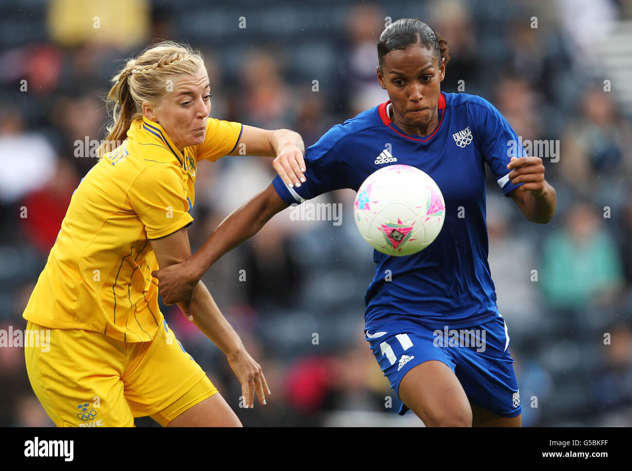 London Olympic Games - Day 7. France's Marie-Laure Delie and Sweden's ...
