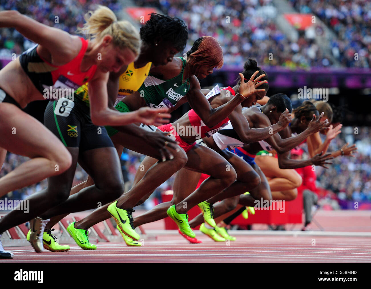 Start womens 100m heats hi-res stock photography and images - Alamy