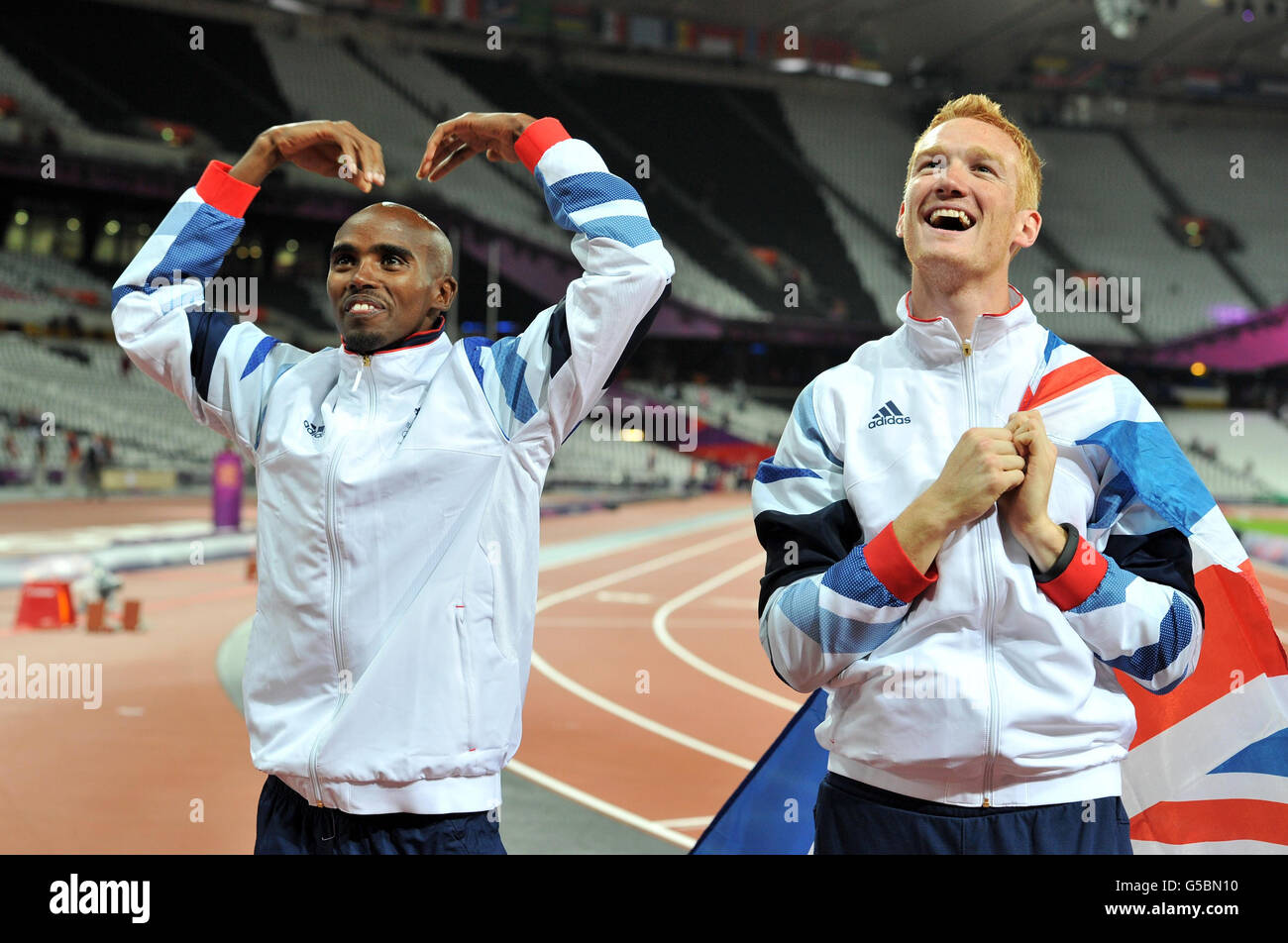 Great Britain's Mo Farah (left) celebrates winning Gold in the Men's 10 ...