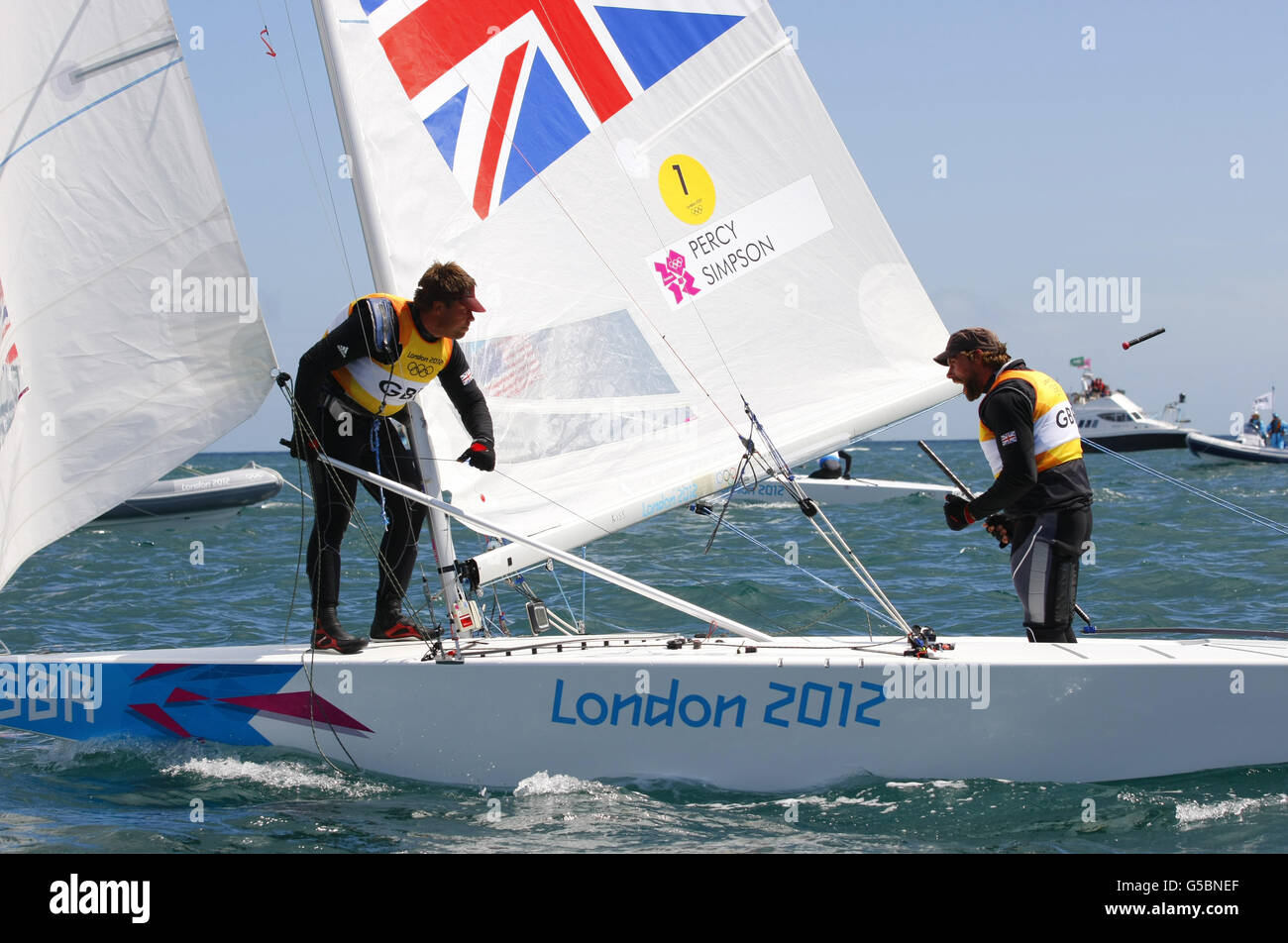 Great Britain's Iain Percy (right) and Andrew Simpson react after ...