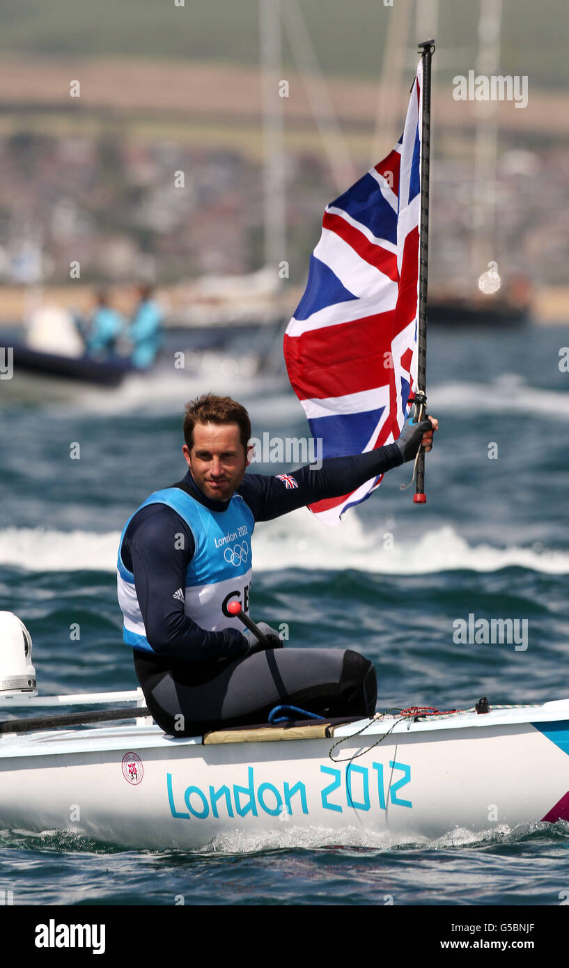 Great Britain's Finn sailor Ben Ainslie celebrates his Gold medal in ...