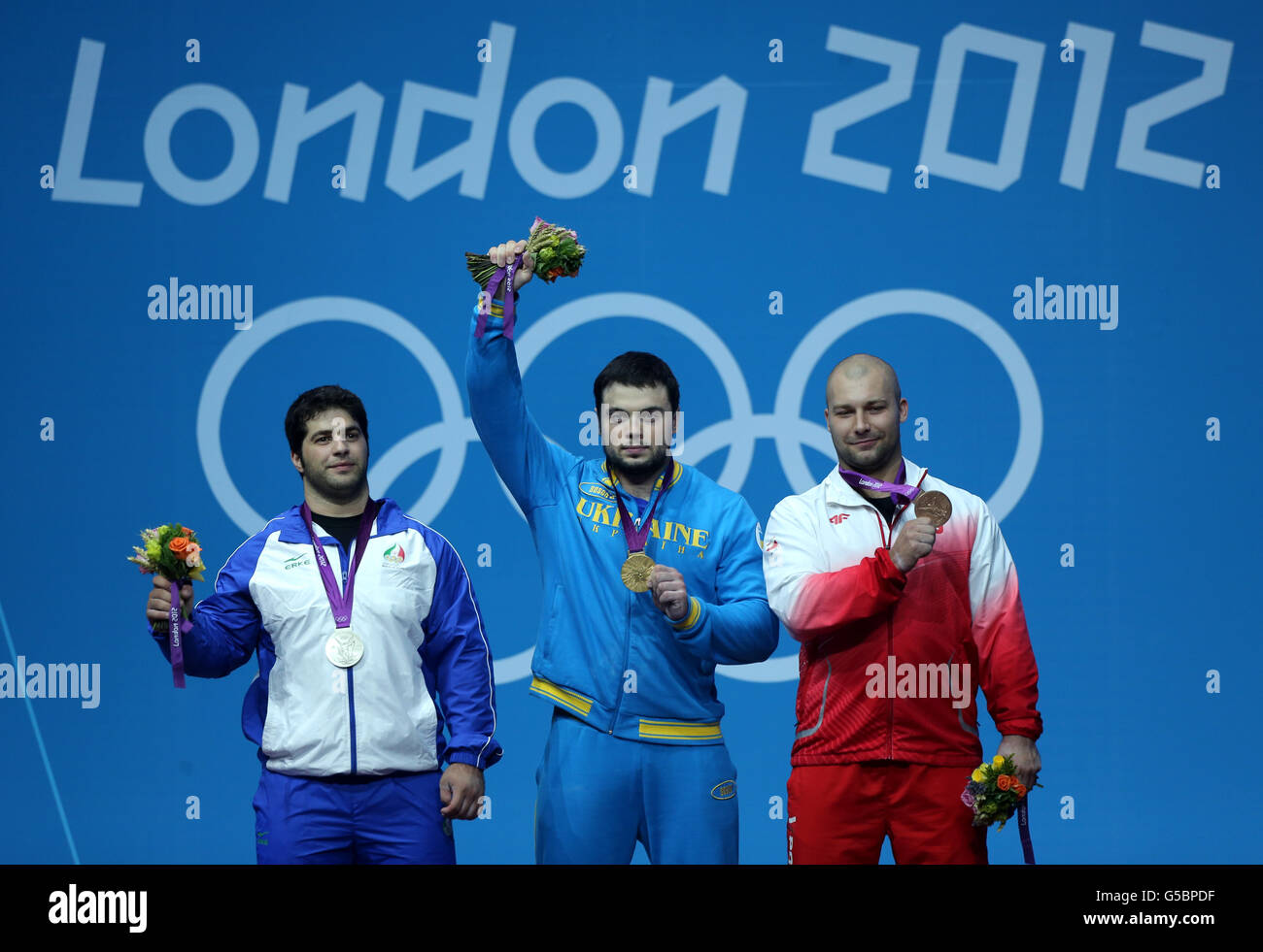 Ukraine weightlifter Oleksiy Torokhtiy celebrates winning the Olympic ...
