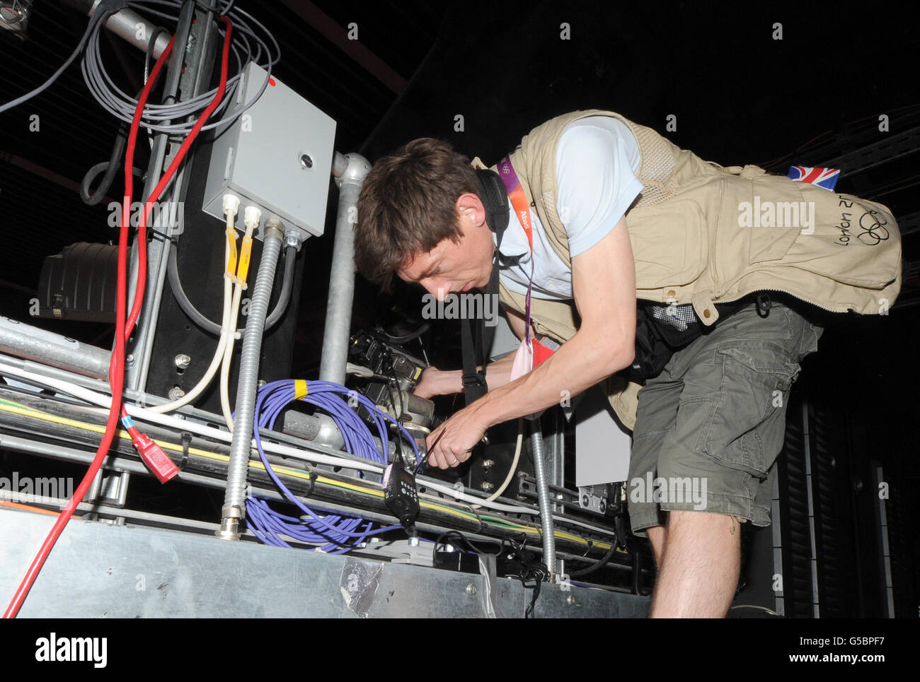 Press Association photographer Anthony Devlin installs a remote camera ...