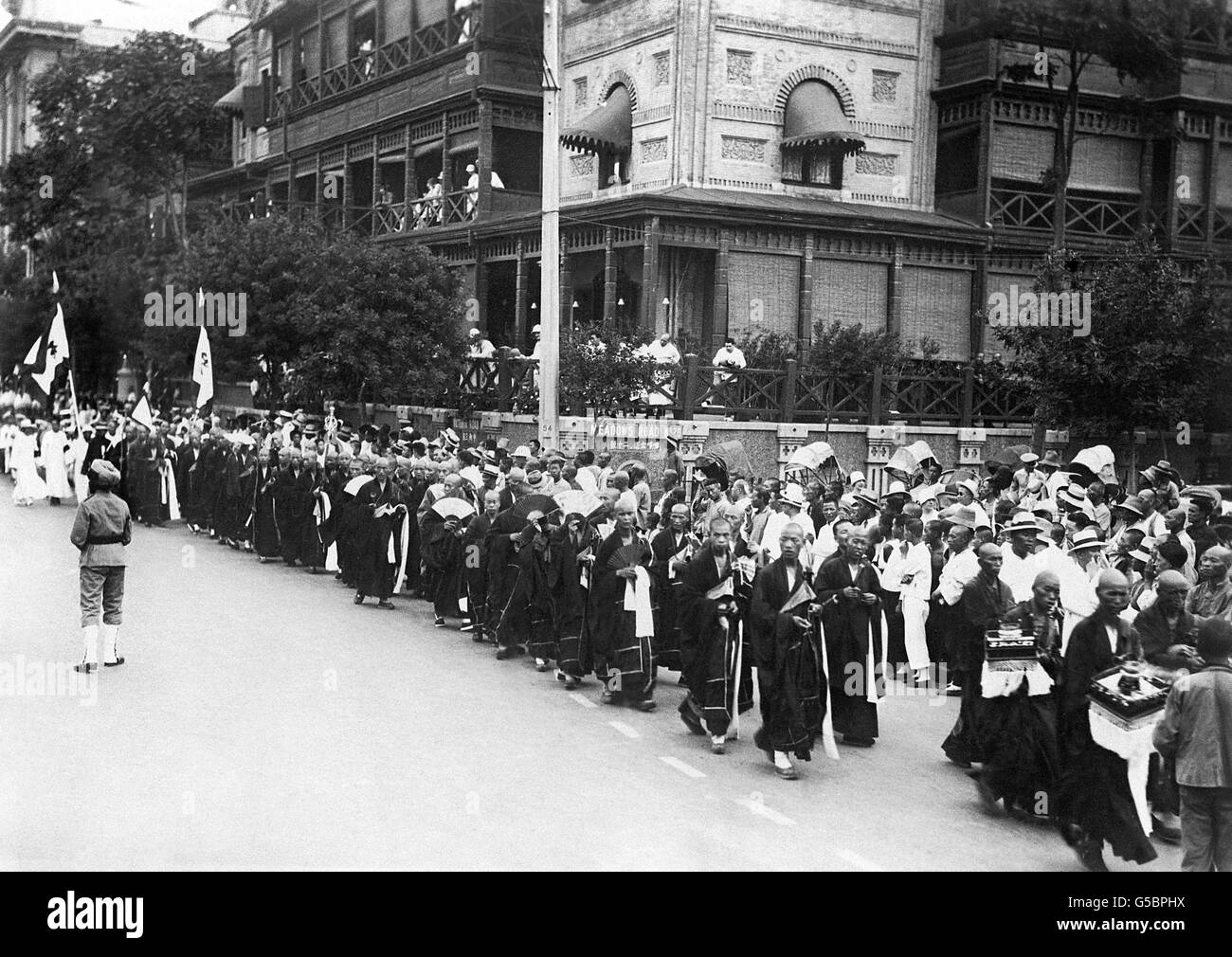 Priests carrying incense holders in the funeral procession for the ...