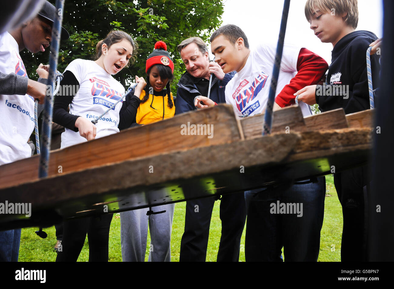 Prime Minister David Cameron takes part in a team building maze puzzle ...