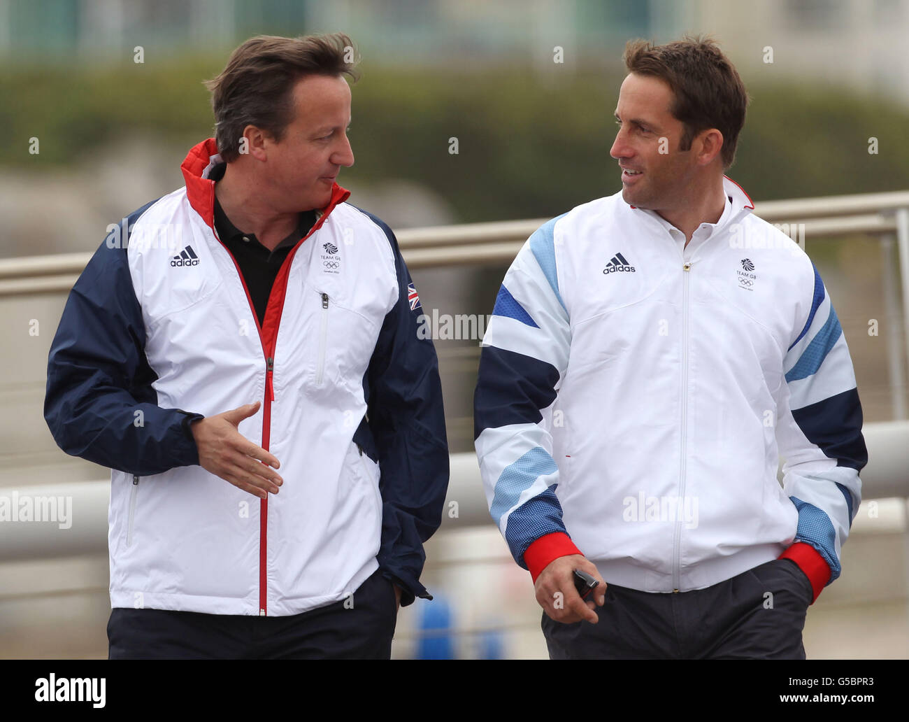 Prime Minister David Cameron walks with Men's Finn Gold medalist Ben ...