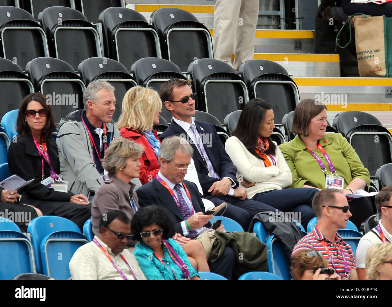 Culture Secretary Jeremy Hunt (back row 3rd left) talks to Ann Romney ...