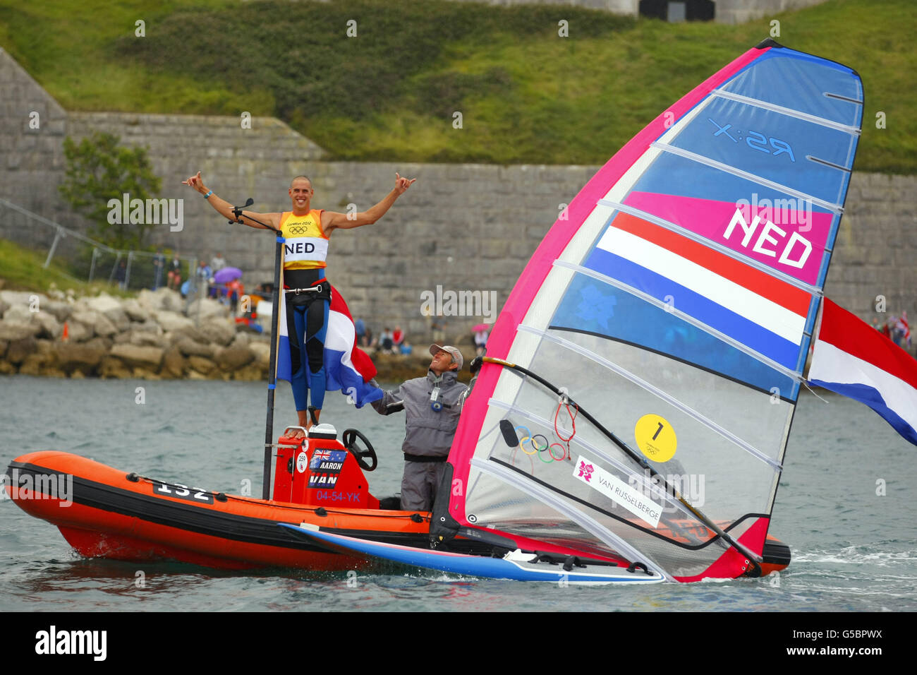 Netherlands' Dorian van Rijsselberge celebrates winning the Gold medal ...