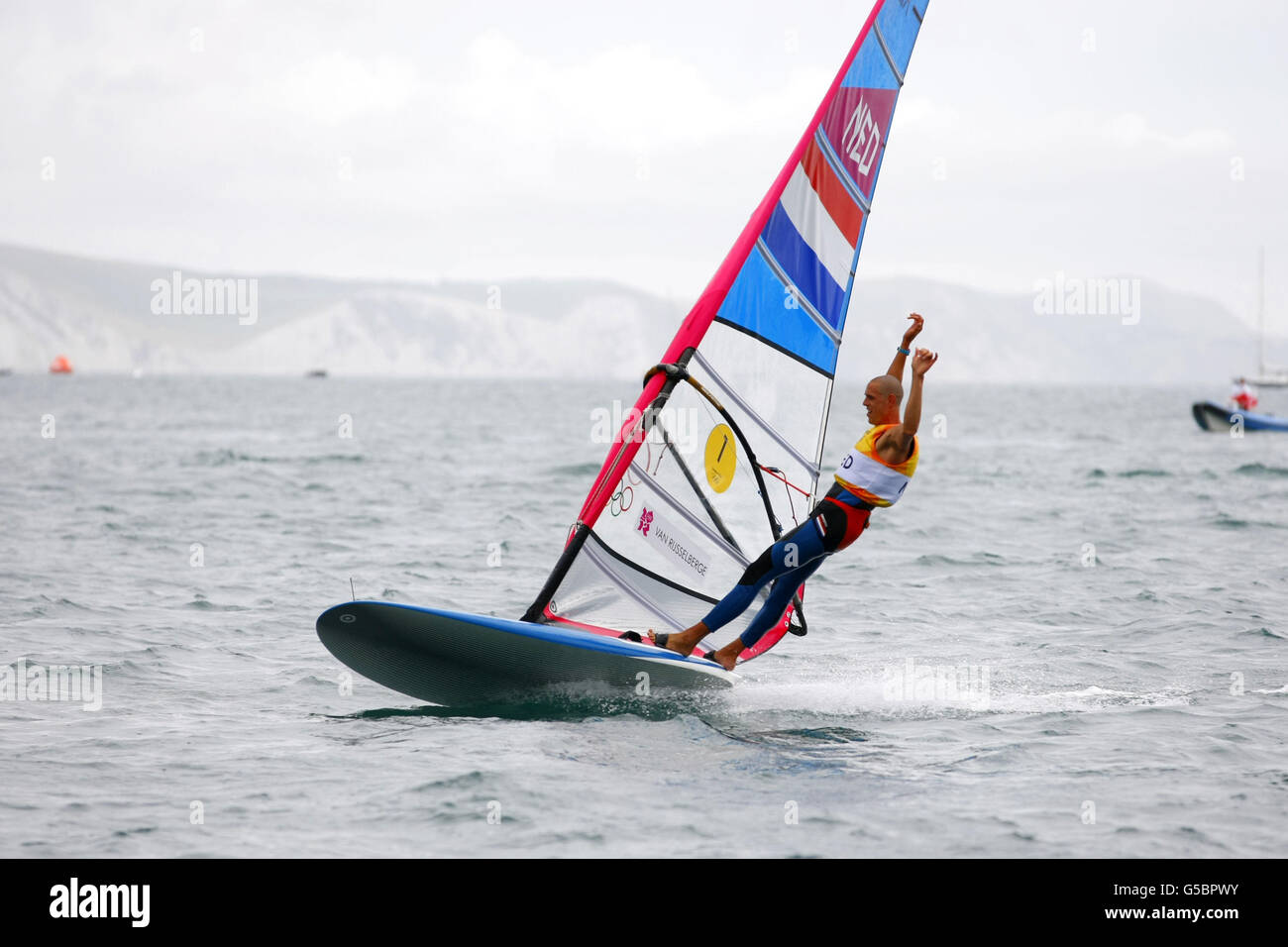 Netherlands' Dorian van Rijsselberge celebrates winning the Gold medal ...