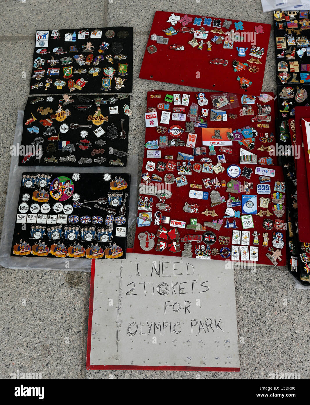 London Olympic Games - Day 12. Pin Badge traders at Stratford ...