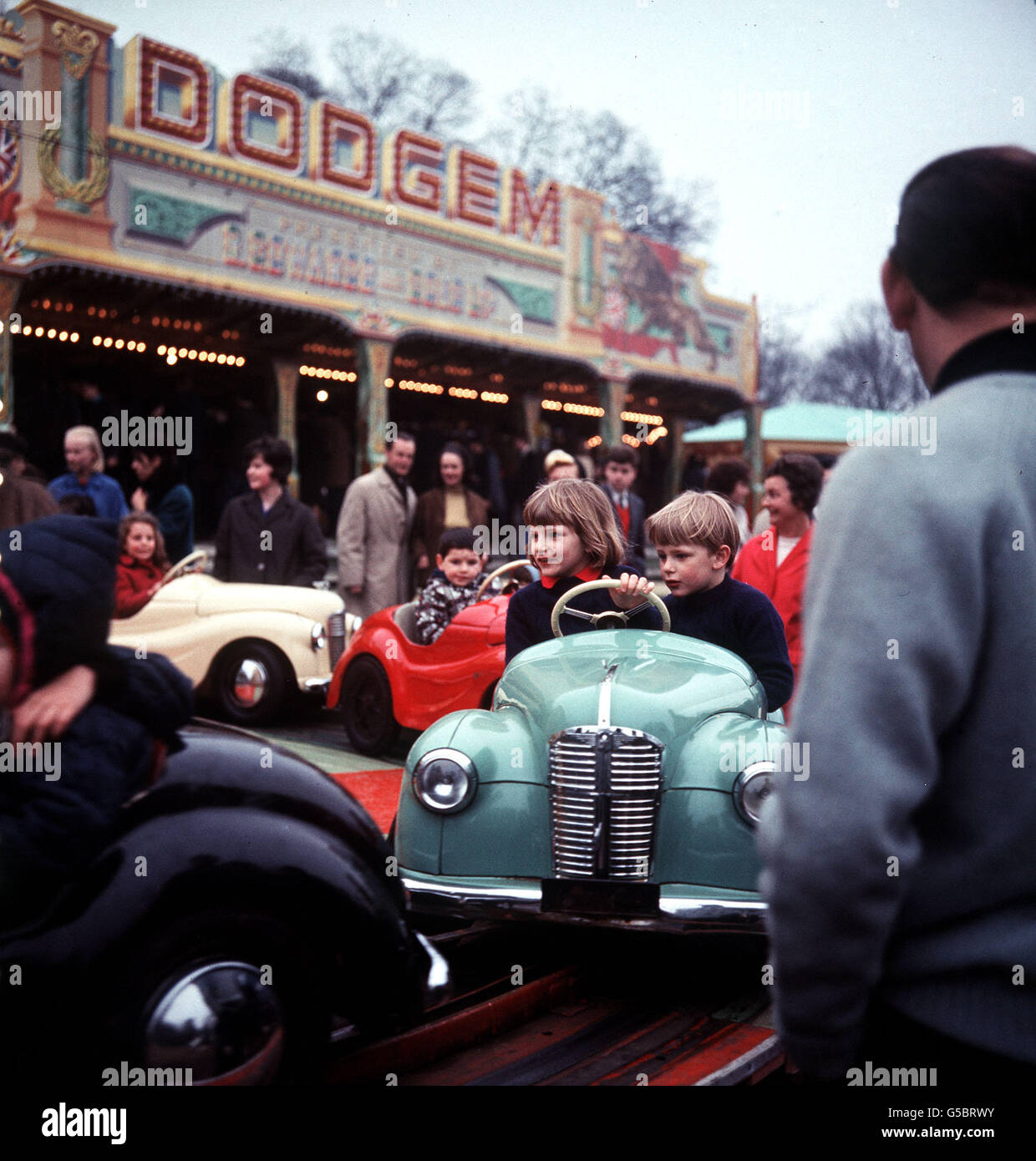 Children on fairground ride 1960s hi-res stock photography and images ...