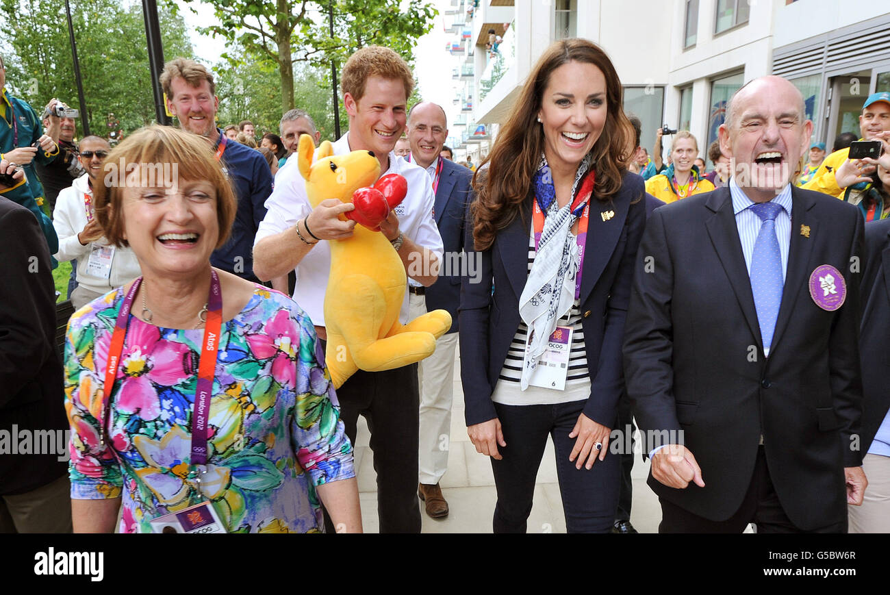 Prince Harry holds a Kangaroo given to him by Australian athletes, as ...