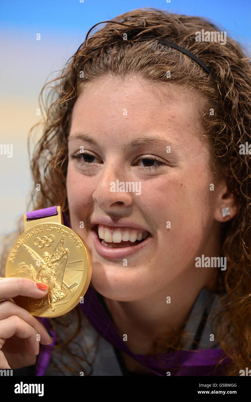 USA's Allison Schmitt celebrates with her gold medal after winning the ...
