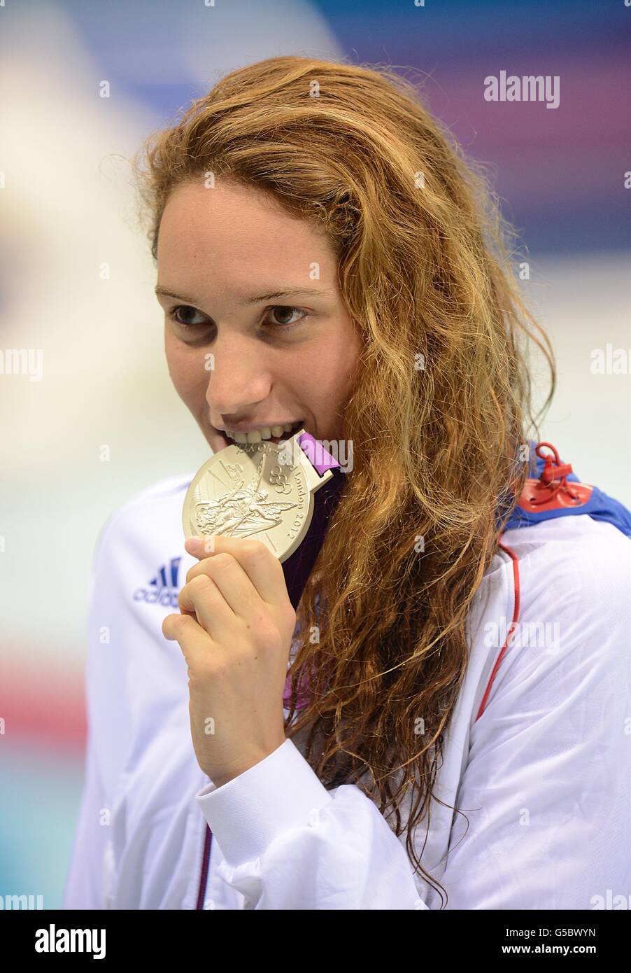 Silver Medalist France's Camille Muffat celebrates with her medal after ...