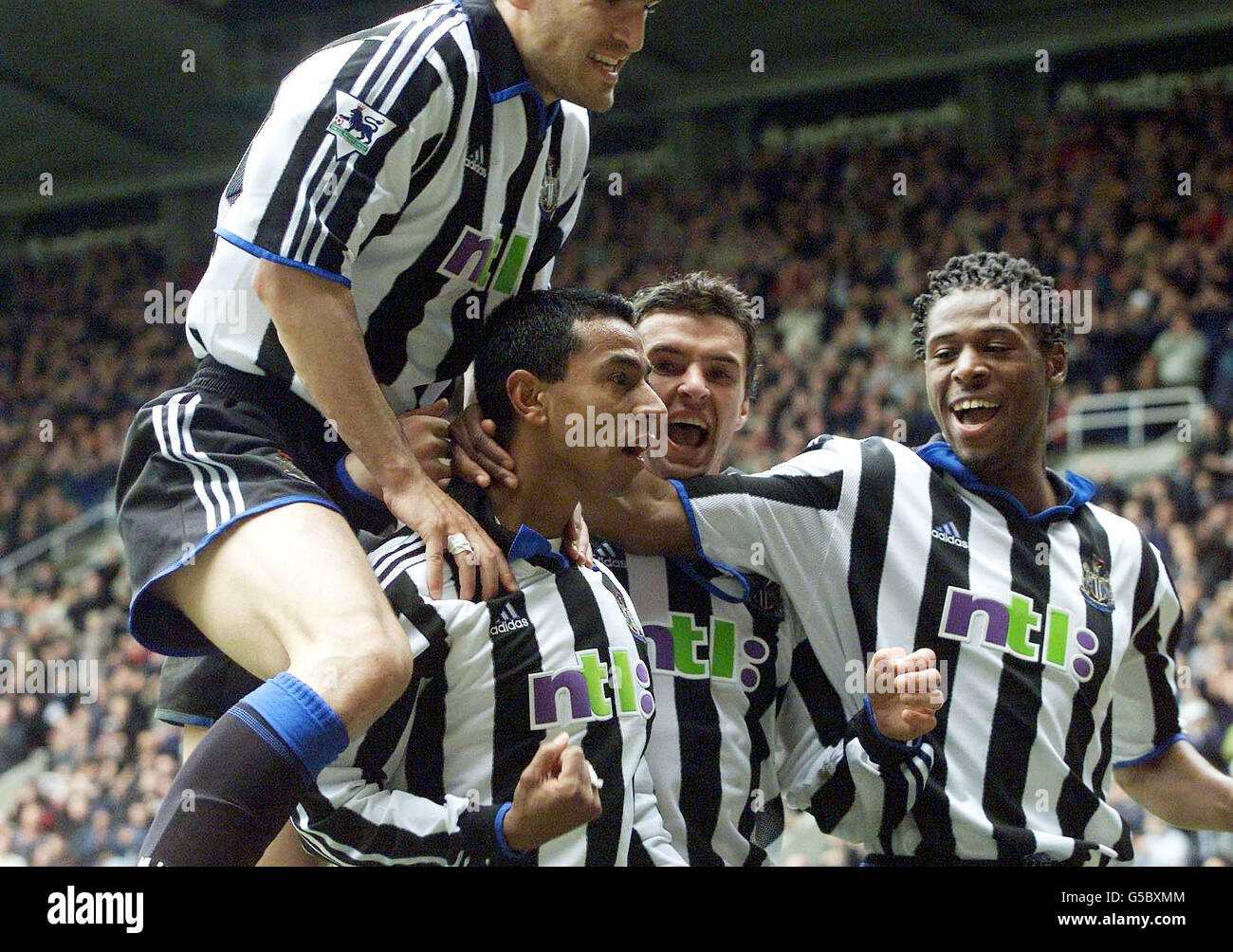 Newcastle United's Nolberto Solano (second left) celebrates his goal ...