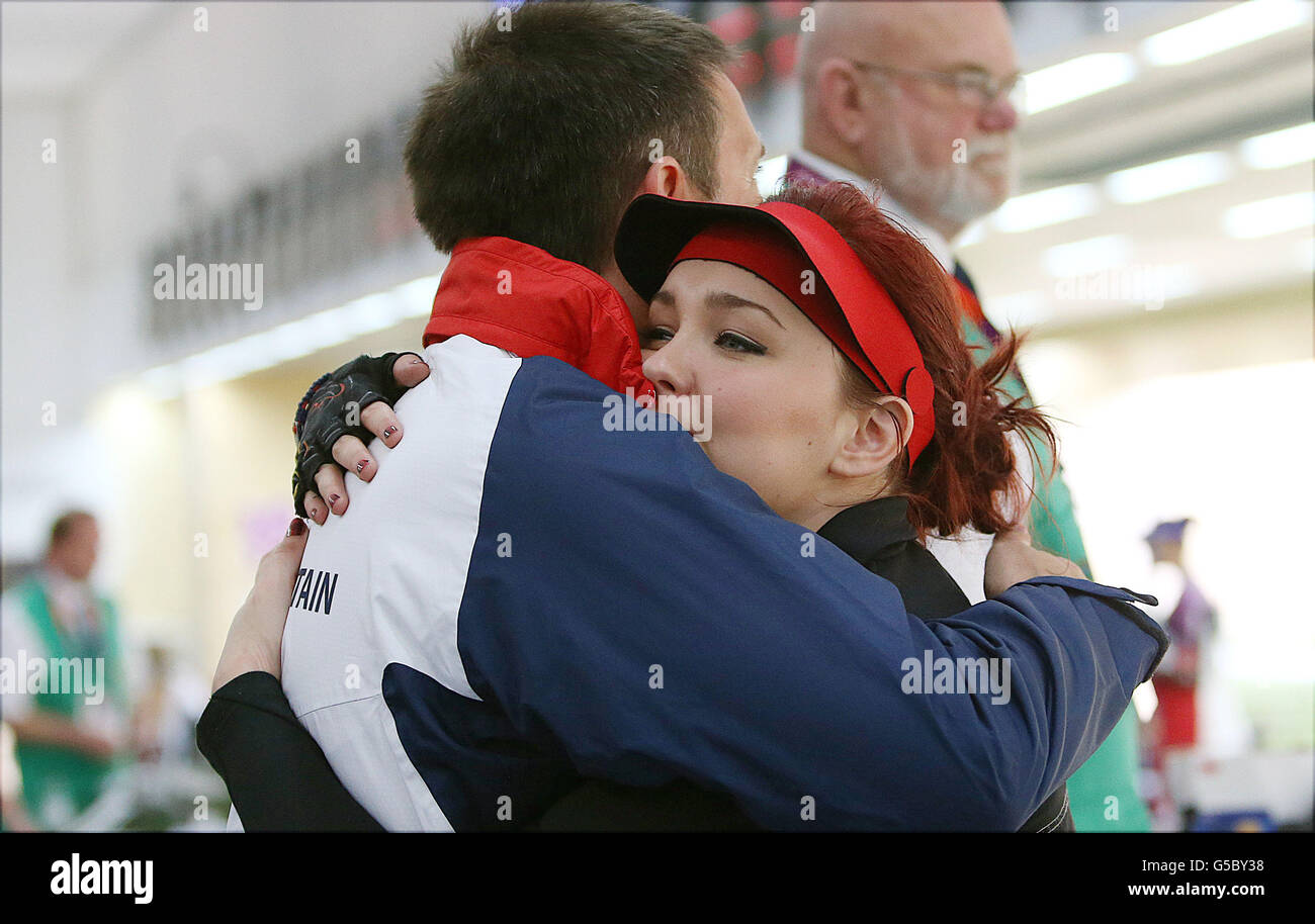 Great Britain's Jennifer McIntosh is consoled by a Team GB Captain ...