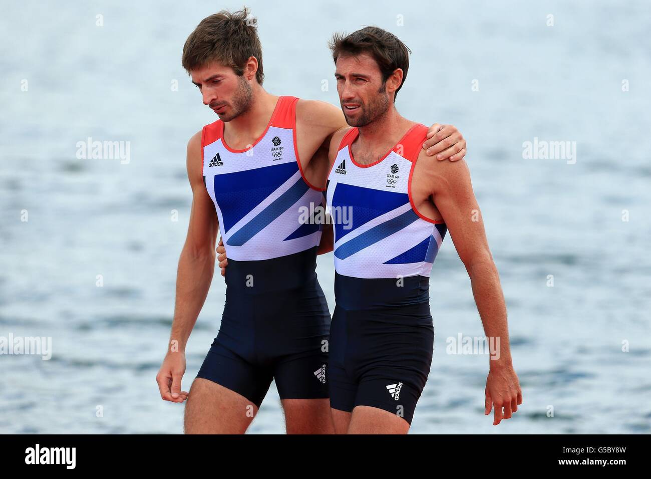Great Britain's Mark Hunter (right) and Zac Purchase comfort one ...