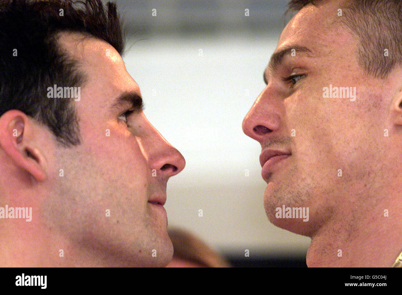 Wales' Joe Calzaghe (left) goes head to head with Mario Veit (right ...