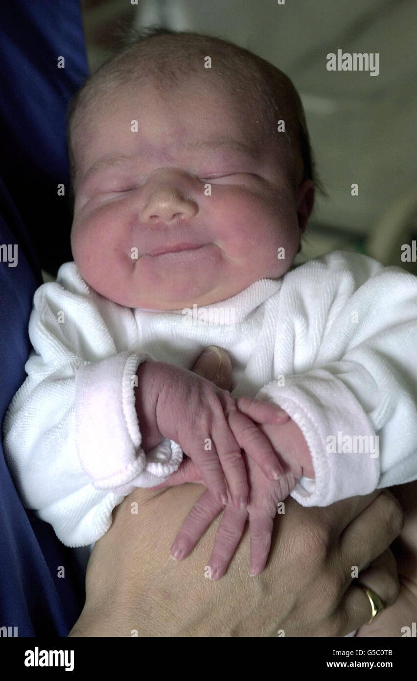 Baby caroline nursed by sister lani tom frimley park hospital hi-res ...