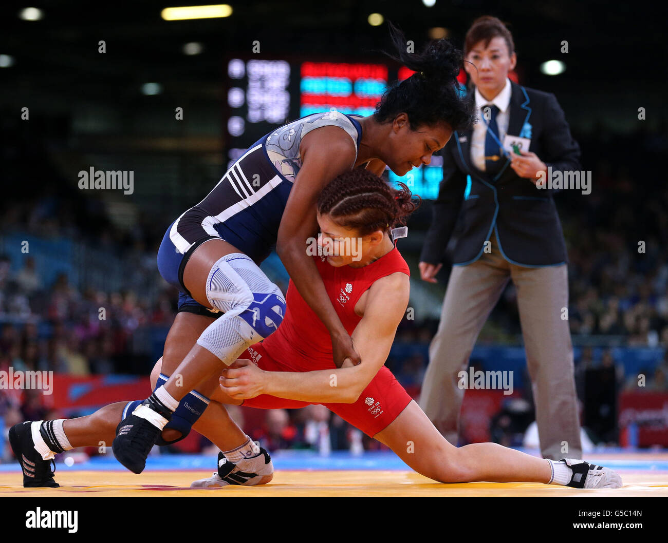 Great Britain's Olga Butkevych (red) in action against Ecuador's ...