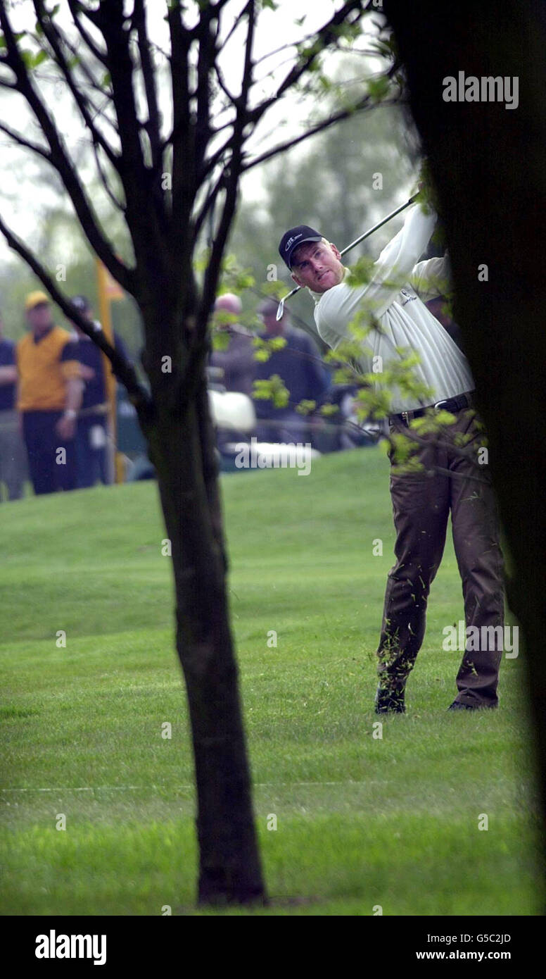 Golf Karlsson. Sweden's Robert Karlsson plays over the trees on the ...