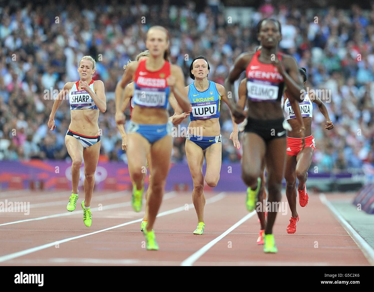 Great Britain's Lynsey Sharp (left) runs on the outside as Kenya's ...