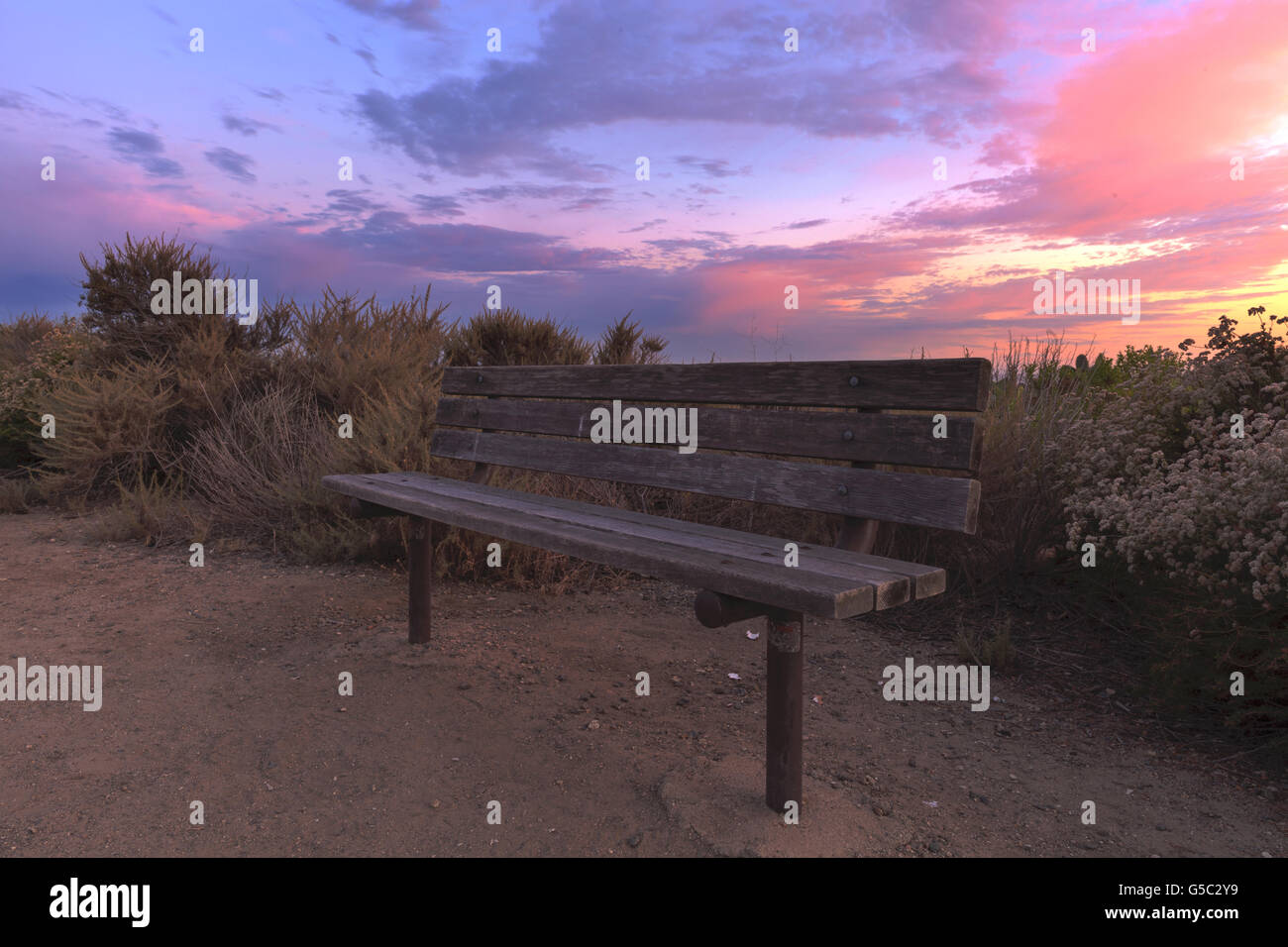 Boardwalk bench at Crystal Cove beach at sunset in the summer Stock ...