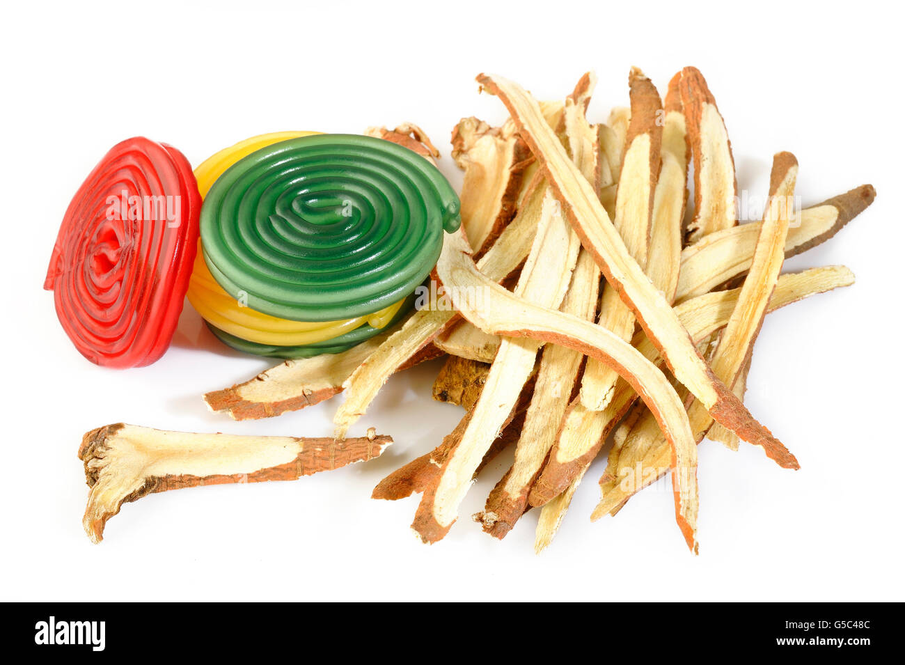 dried liquorice roots and colorful liquorice licorice spiral candies ...