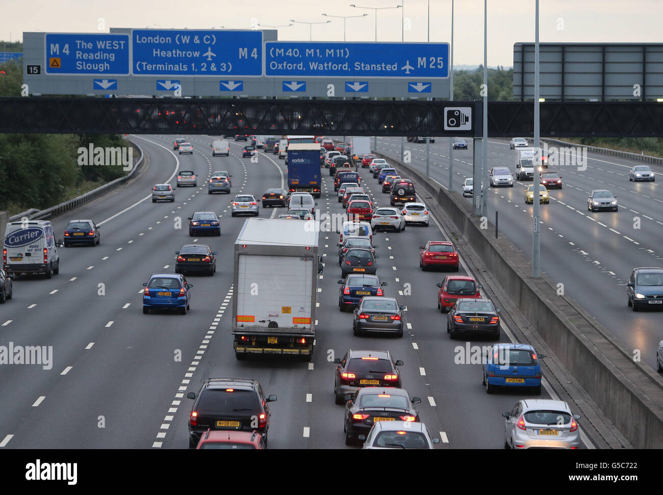 Vehicles queue on the M25 motorway near Heathrow as people get away for ...