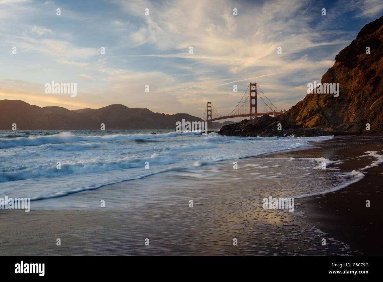The Golden Gate Bridge at sunset, seen from Baker Beach, San Francisco ...
