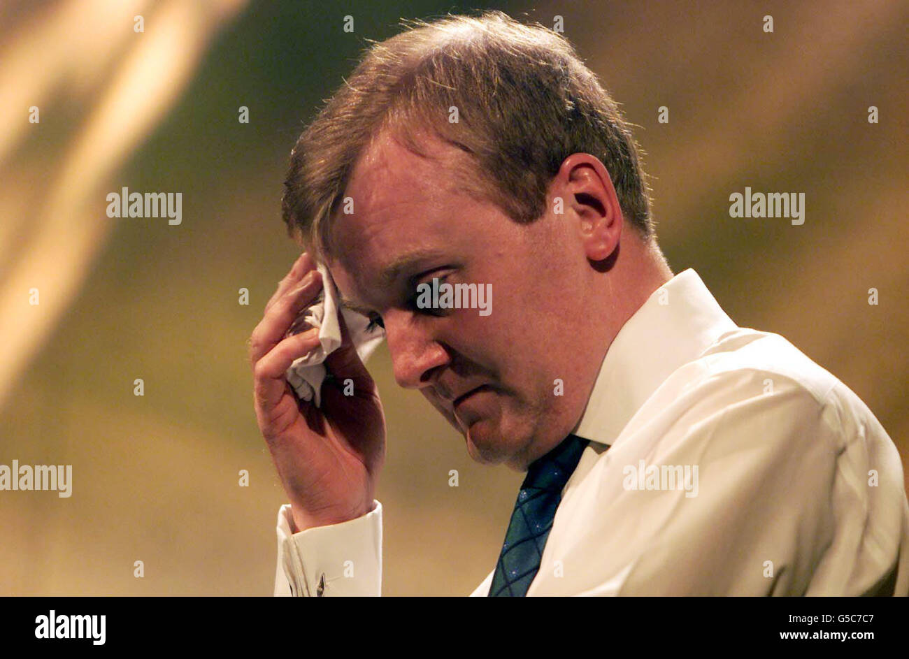 Sweating mopping brow hand on head politics pressure charles kennedy hi ...