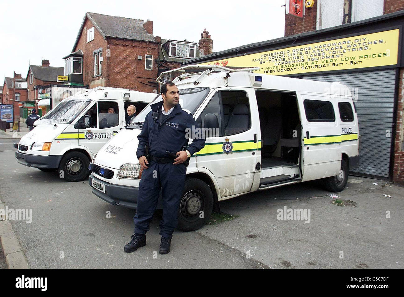 Police patrol the harehills area of leeds hi-res stock photography and ...