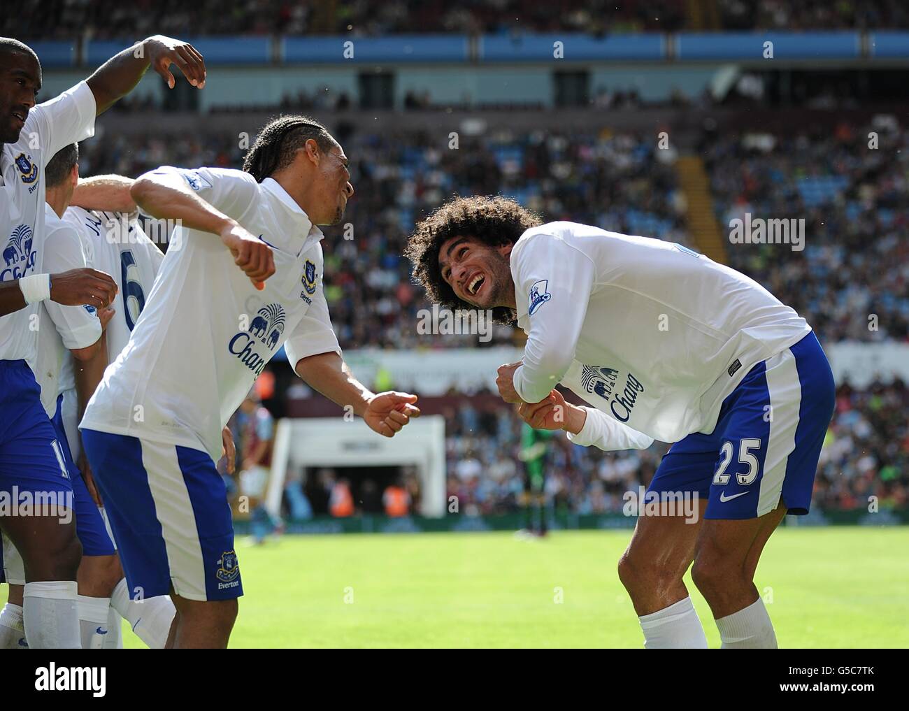 Everton's Marouane Fellaini celebrates scoring his side's second goal ...