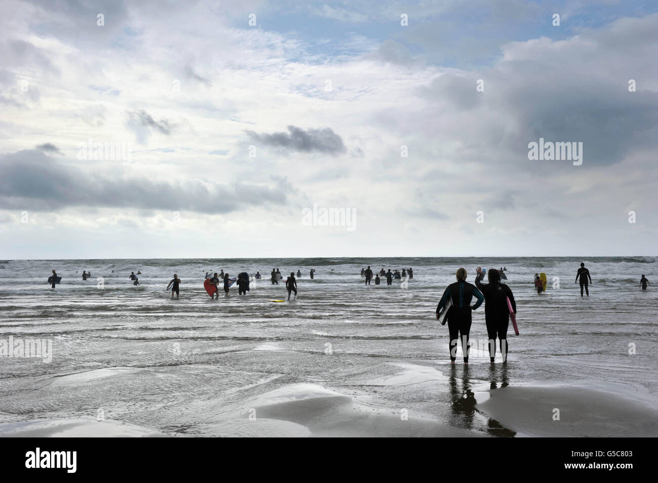 Bodyboarders on croyde beach during the bank holiday weekend hi-res ...
