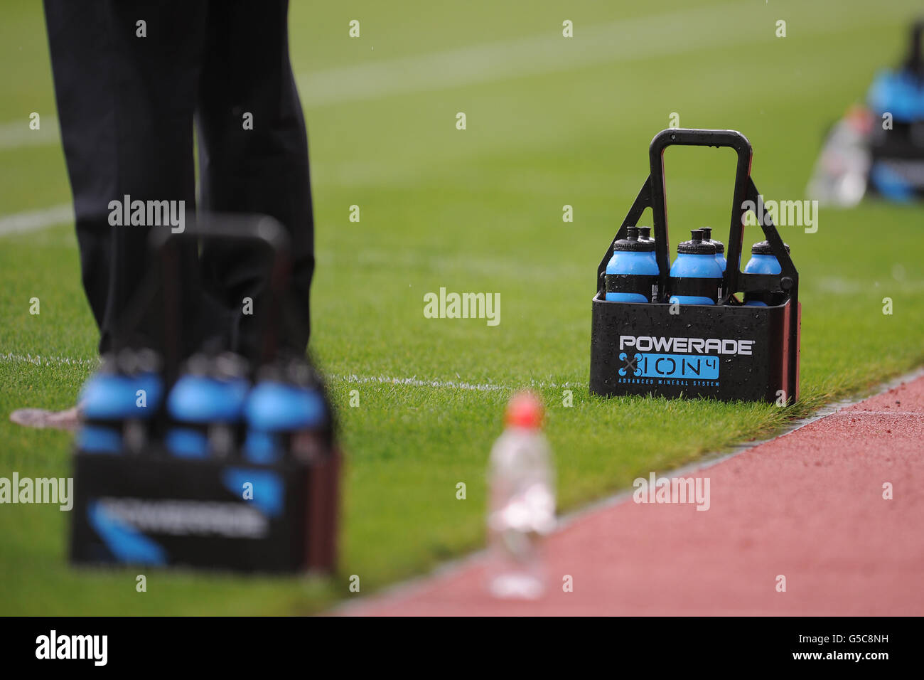 Powerade left by the side of the pitch hi-res stock photography and ...