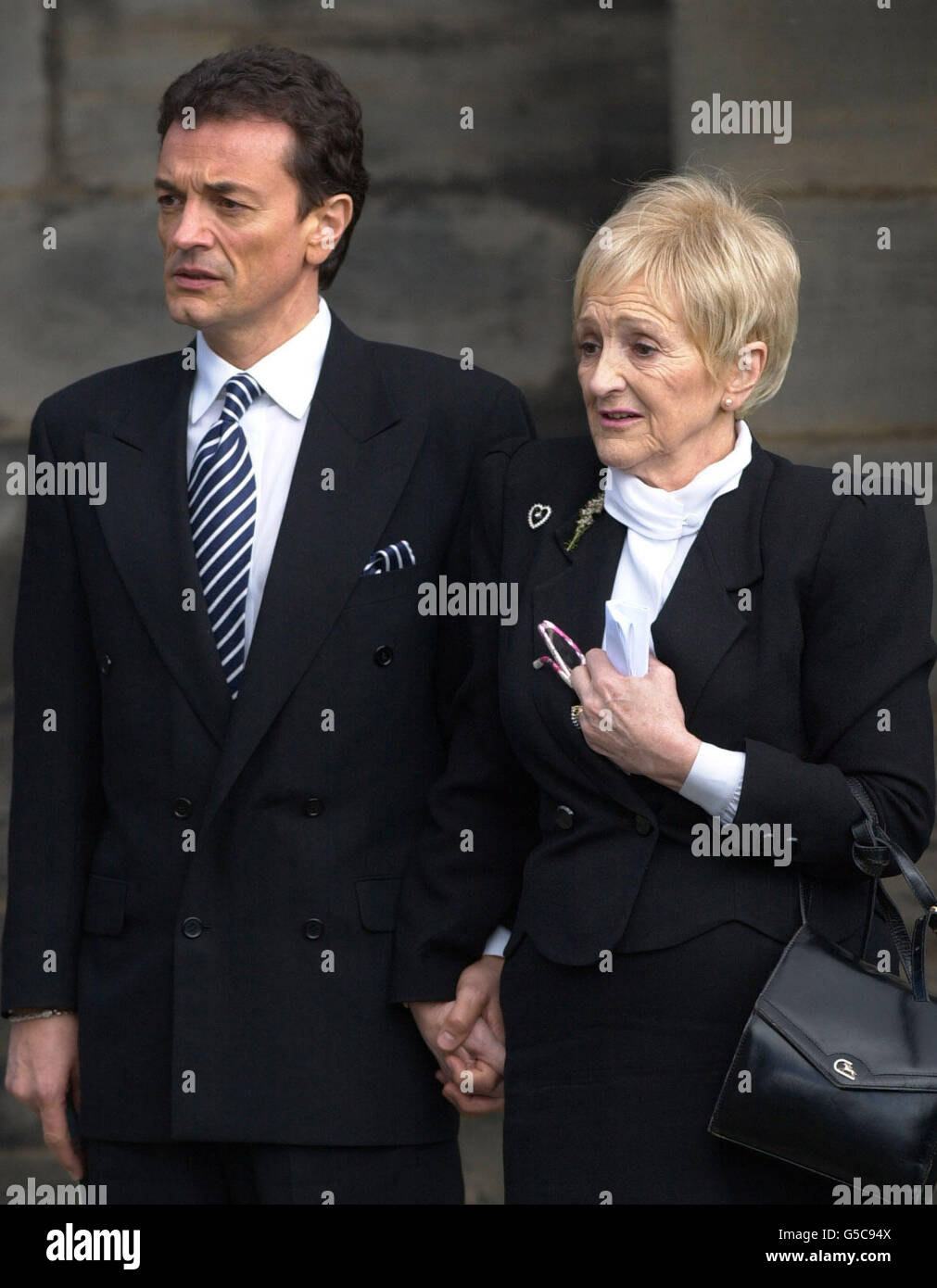 Logan funeral nephew & sister Stock Photo - Alamy