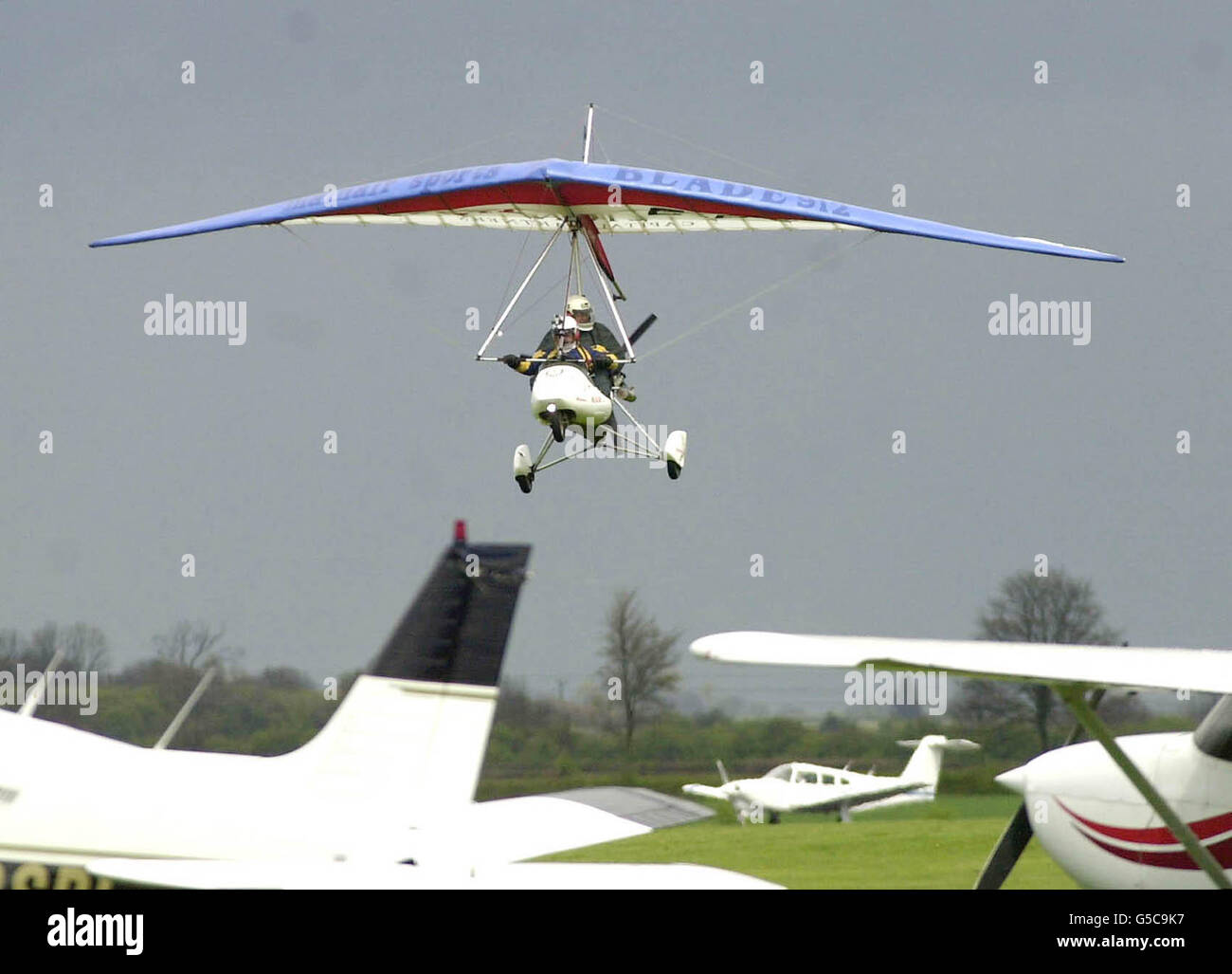 Microlight pilot Brian Milton (front) flies heart patient Peter ...