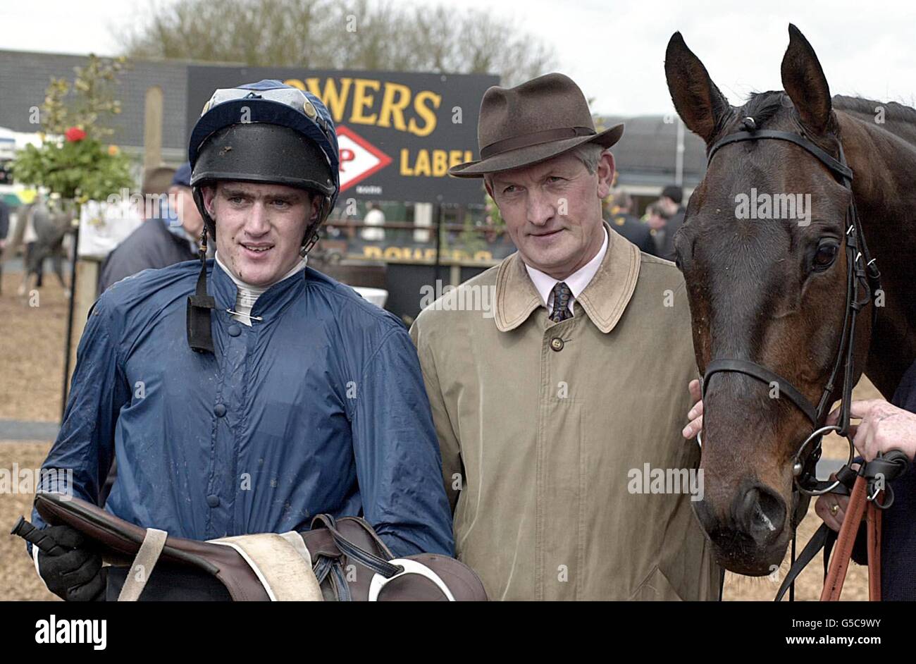 Trainer Des Hughes and jockey Kieran Kelly with Colonel Braxton after ...