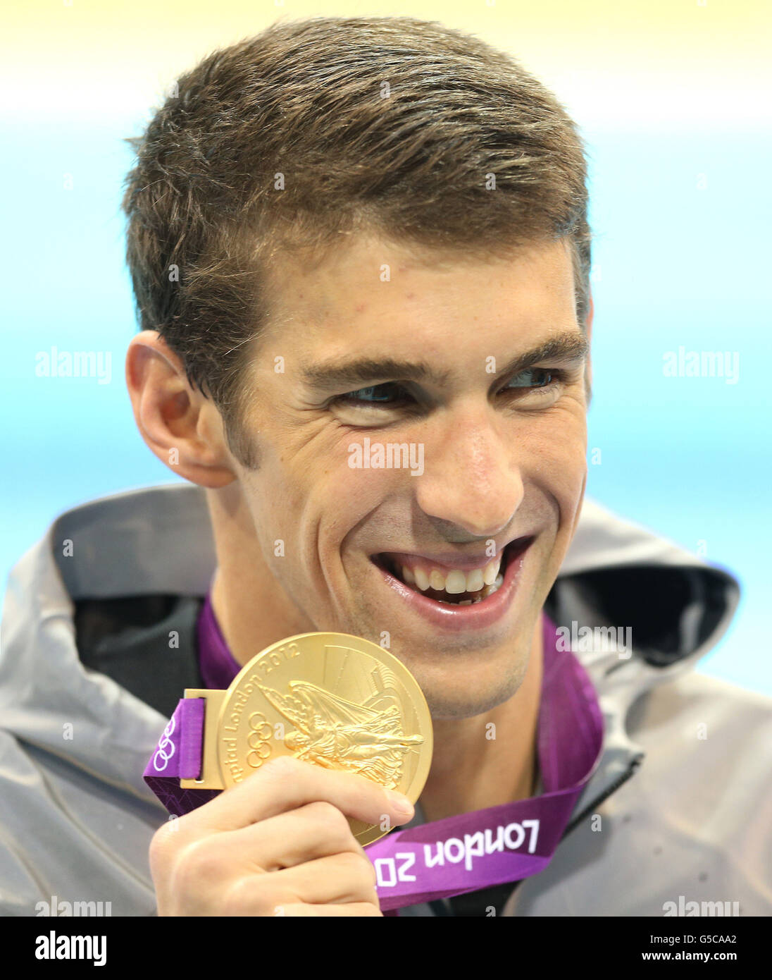 USA's Michael Phelps with his gold medal following his victory in the ...