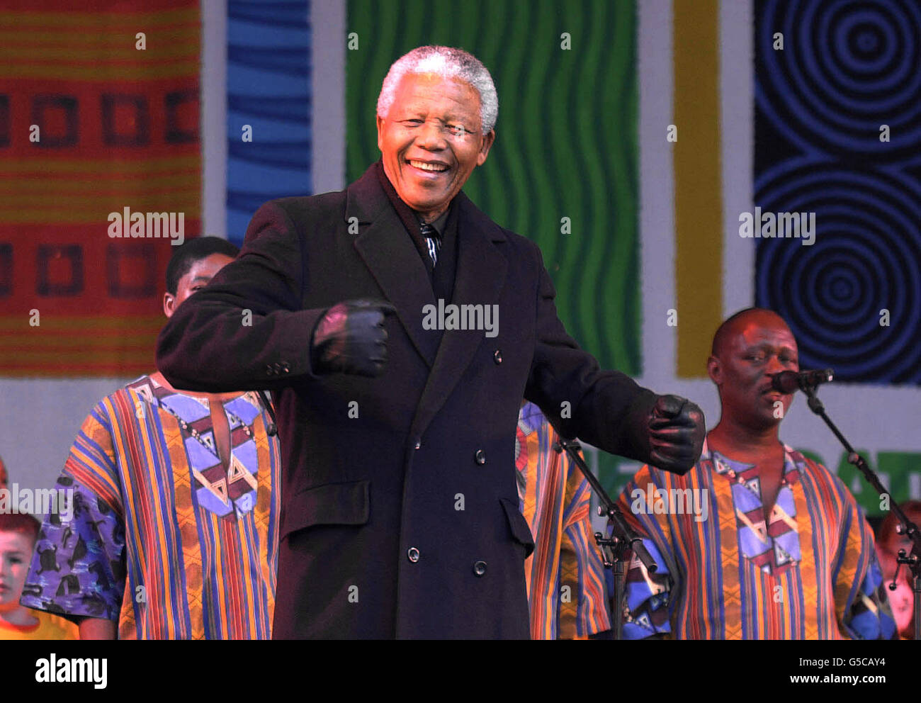 Former South African president Nelson Mandela joins in the dancing on ...