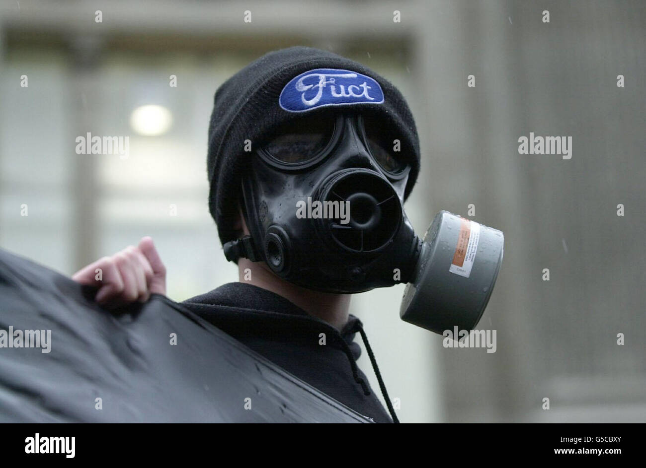 Protesting gas mask woolley hat logo hi-res stock photography and ...